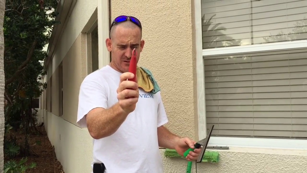 How to scrape a window with a razorblade - YouTube