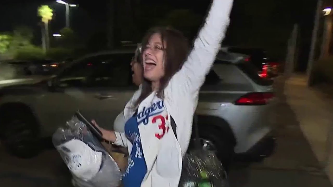 Dodger fans celebrate first win against the Yankees in World Series ...