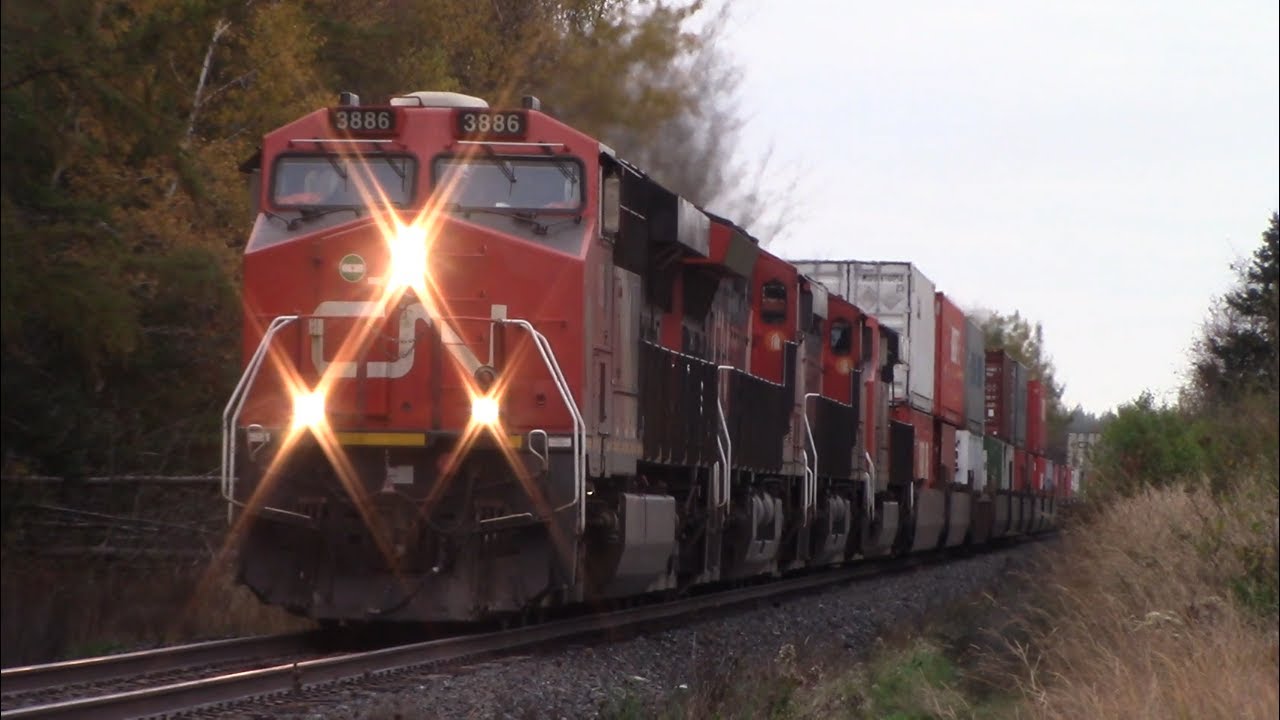 Three CN 100's! Huge 14K Foot Stack Train CN 120 w/DPU Passing Nappan ...