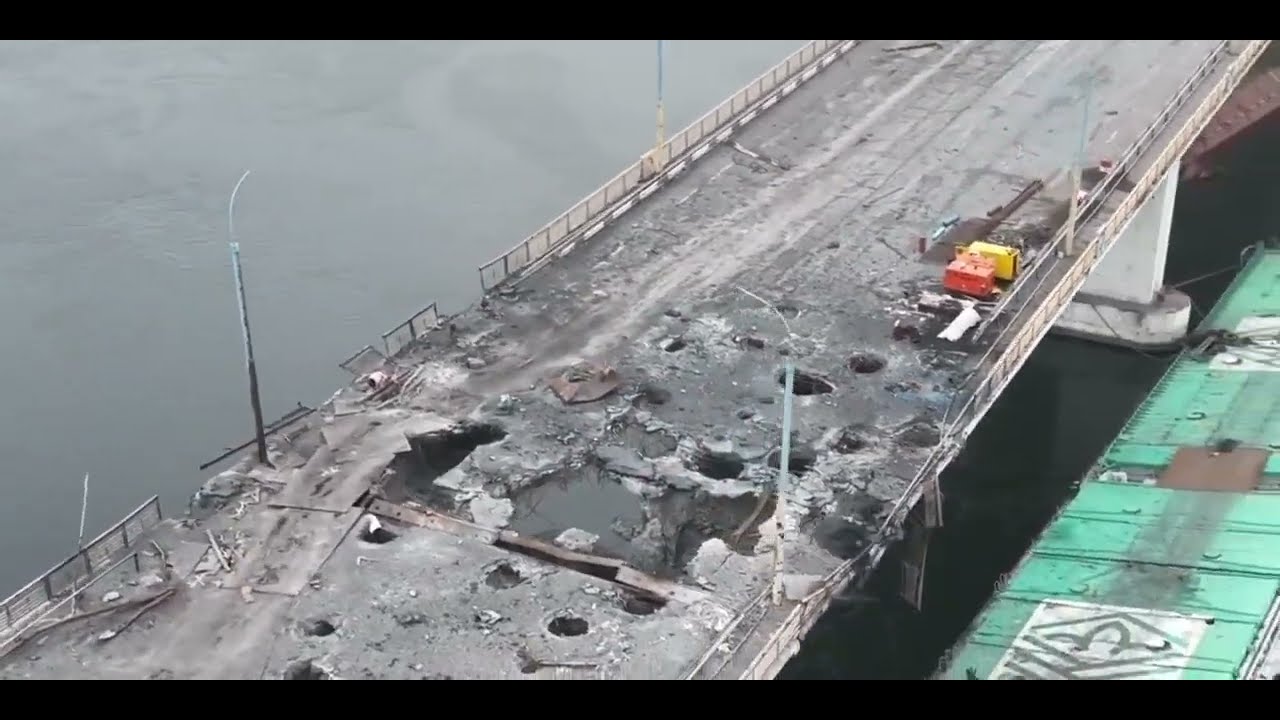 Drone view of the Antonovsky Bridge, blown up by the retreating Russian ...