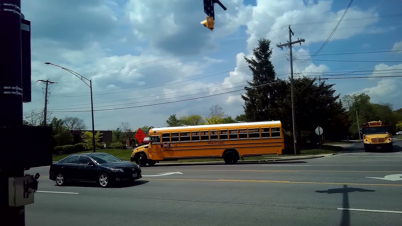 School Buses Leaving John Sells Middle School - YouTube