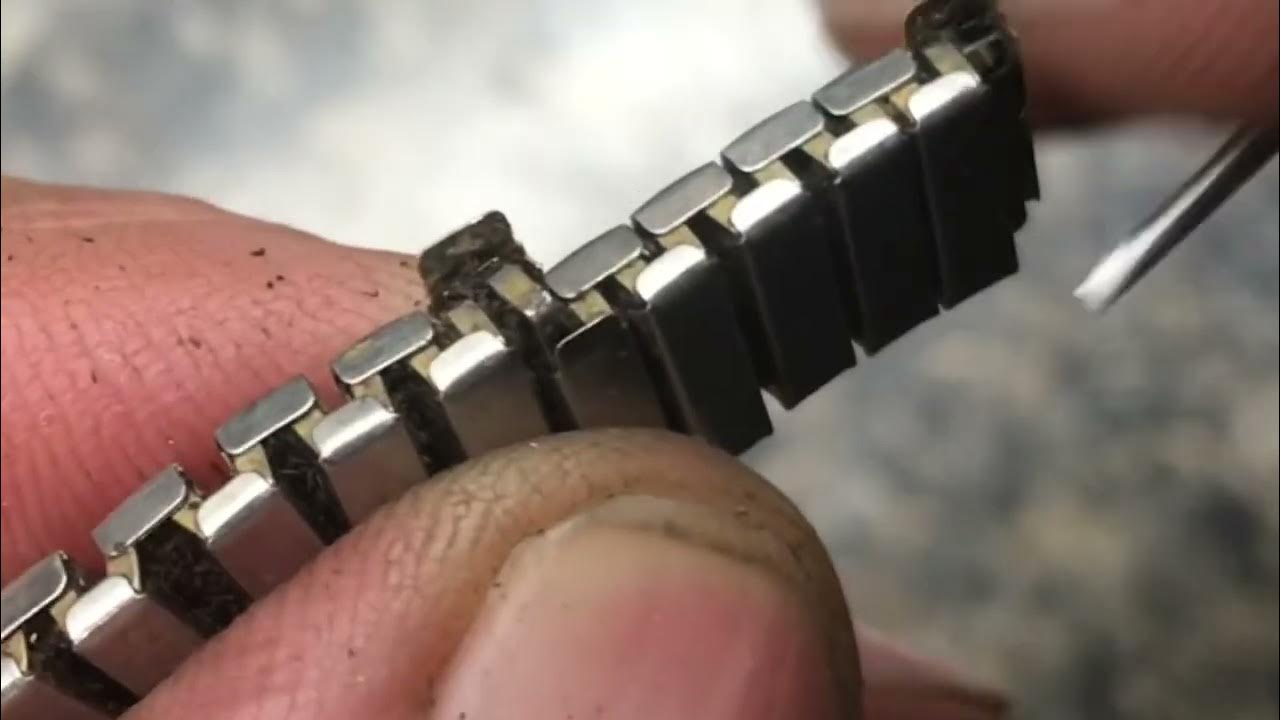 removing LINKS in a “speidel twist ” wristband - YouTube