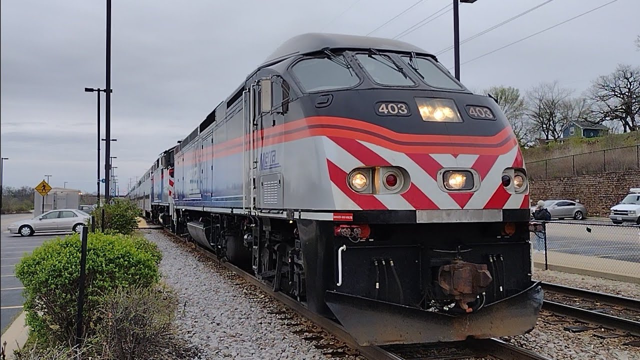 Metra MP36 403 & F59PH-3 97 double-header west at National St. in Elgin ...