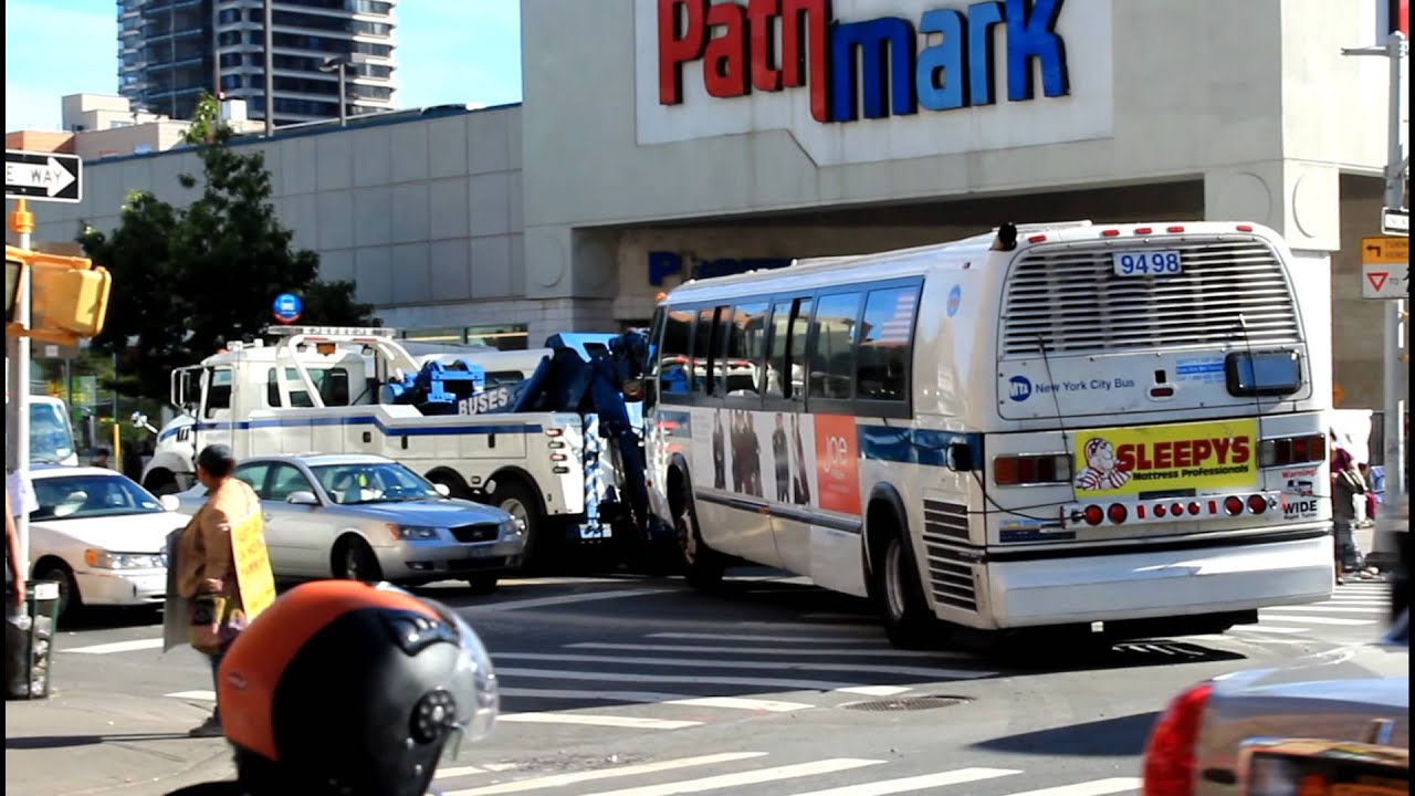 NYCTA Bus: NovaBus RTS #9498 (M35) Bus being towed away in East Harlem ...