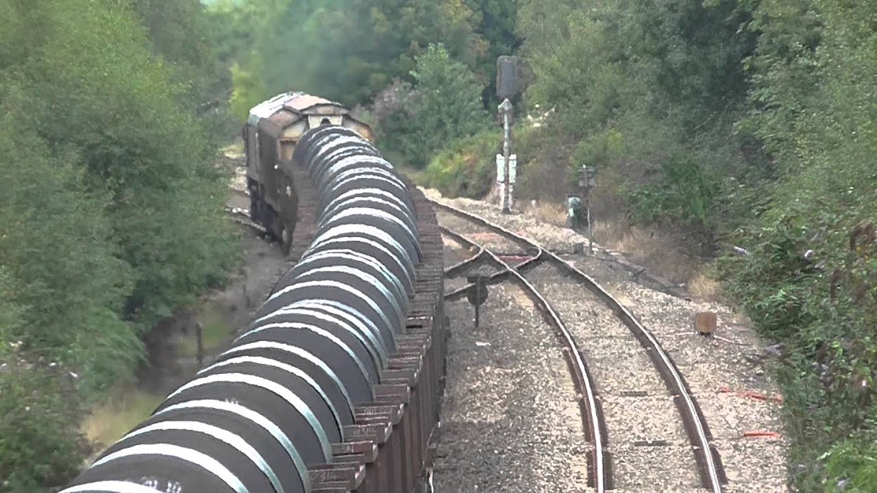 66020 works a Margam to Trostre Works steel coils + a Cargowagon. - YouTube