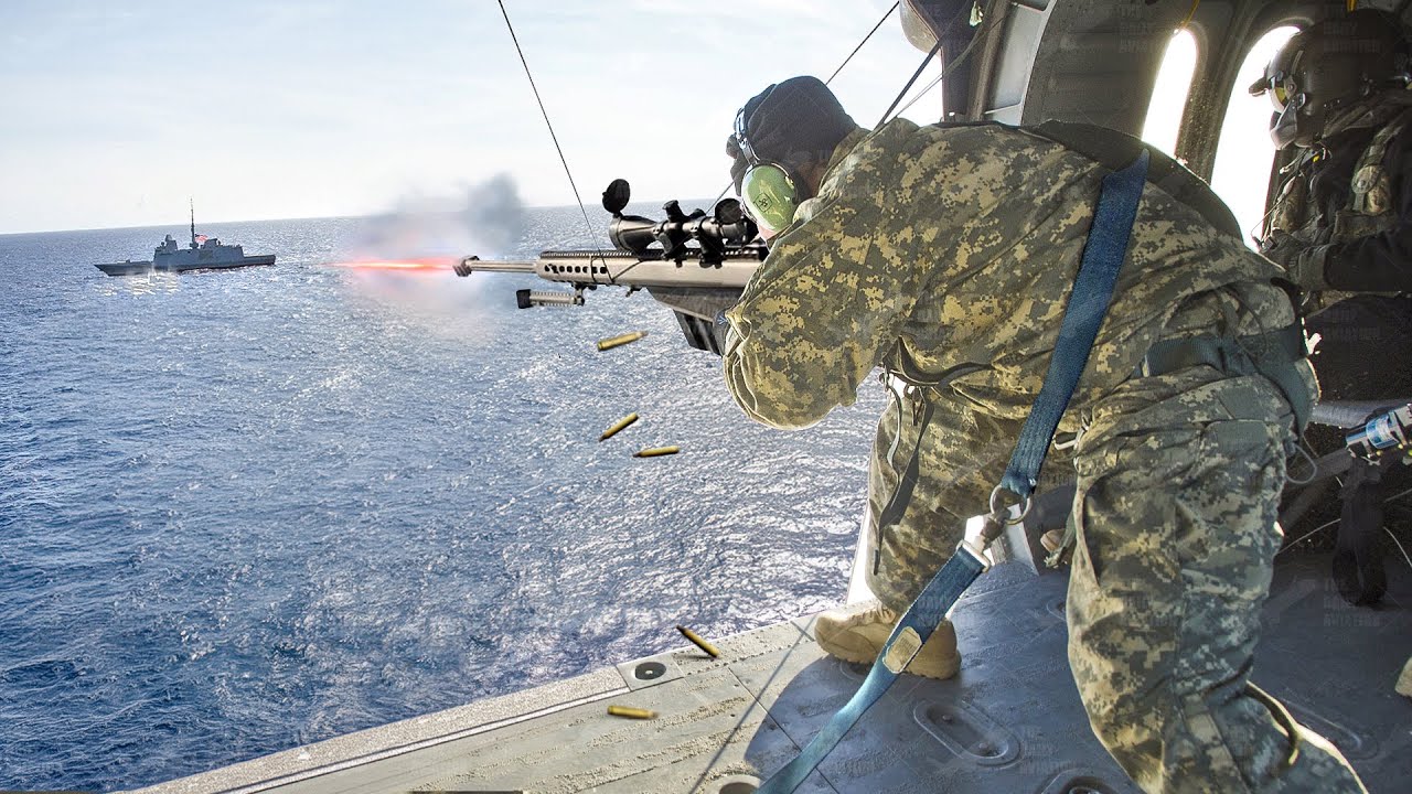US Skilled Marine Sniper Shoots Moving Target from Helicopter at Sea ...