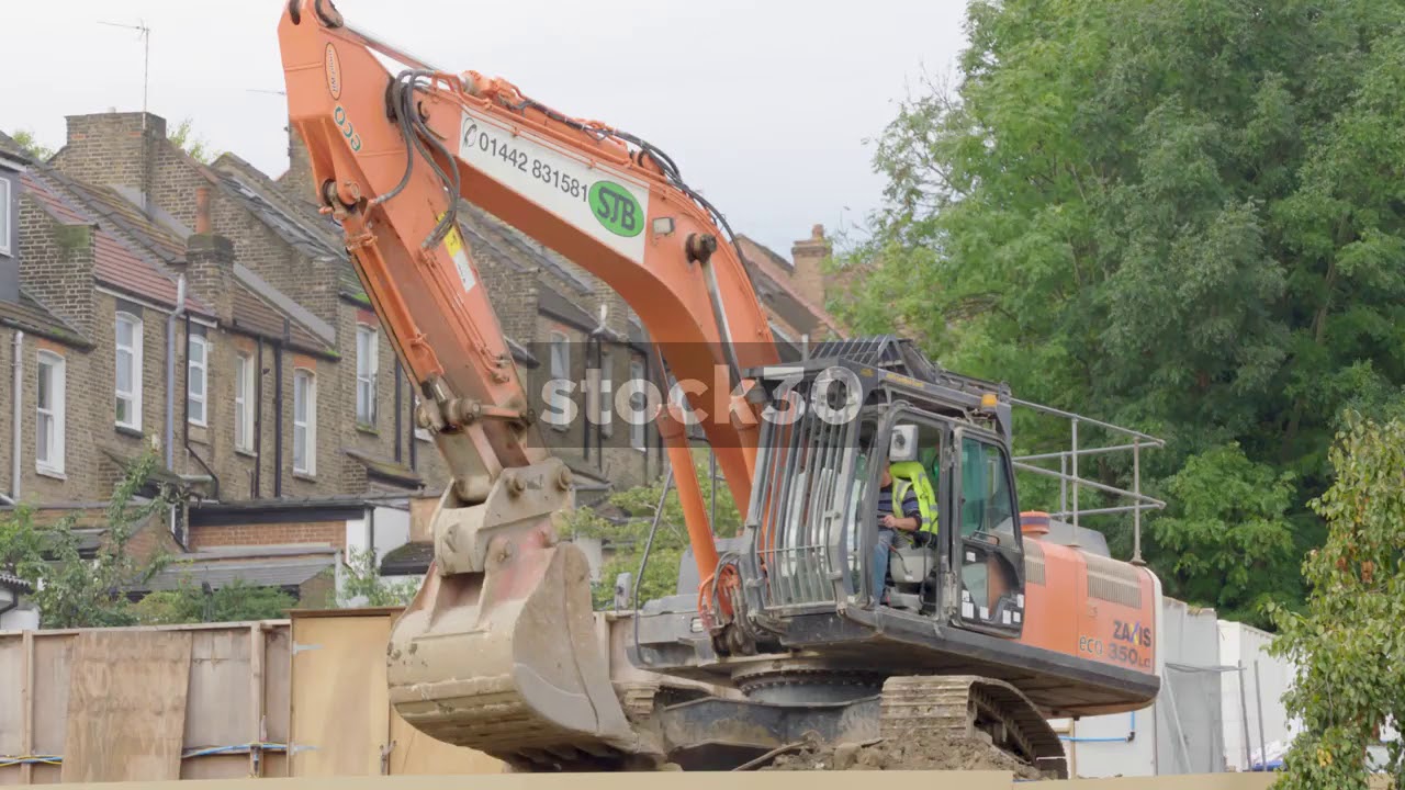 A Digger On A Construction Site In London, UK - YouTube