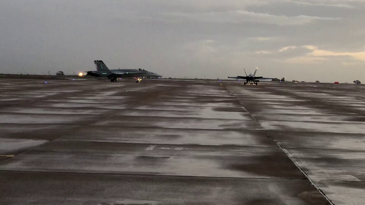 F18 Hornet afterburner takeoff in the rain - YouTube