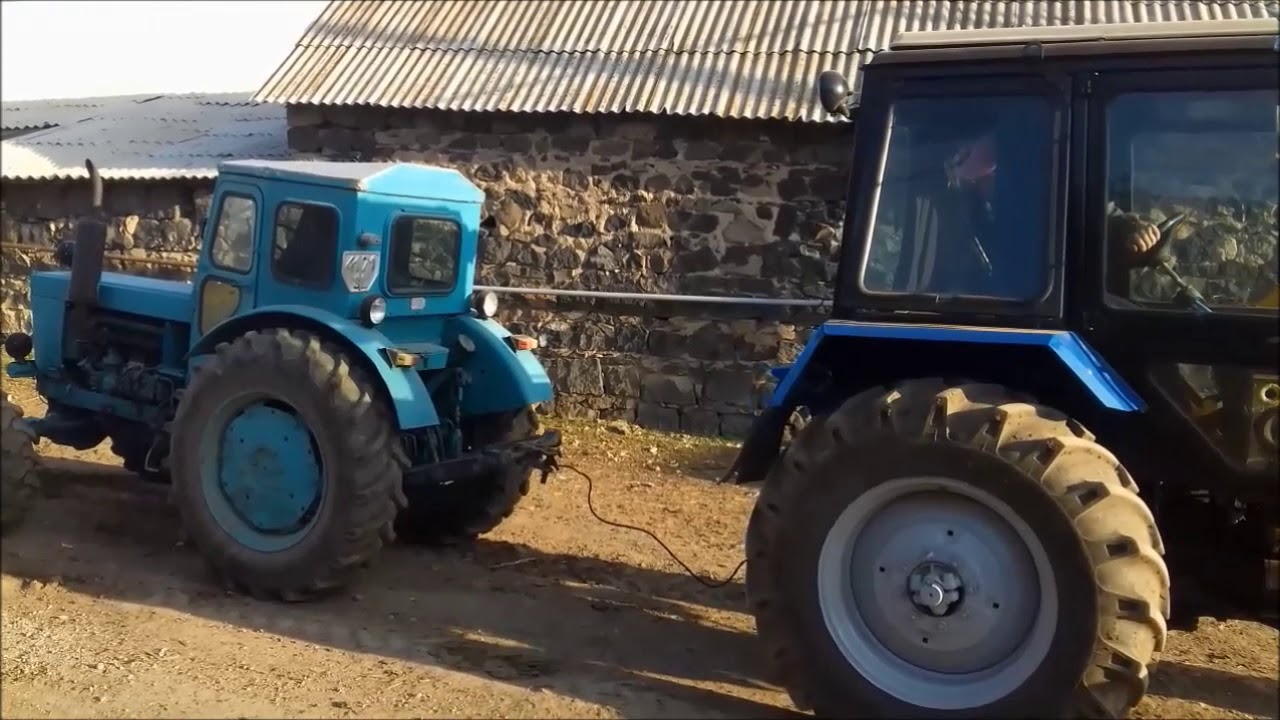 mtz-82 vs t40 - YouTube