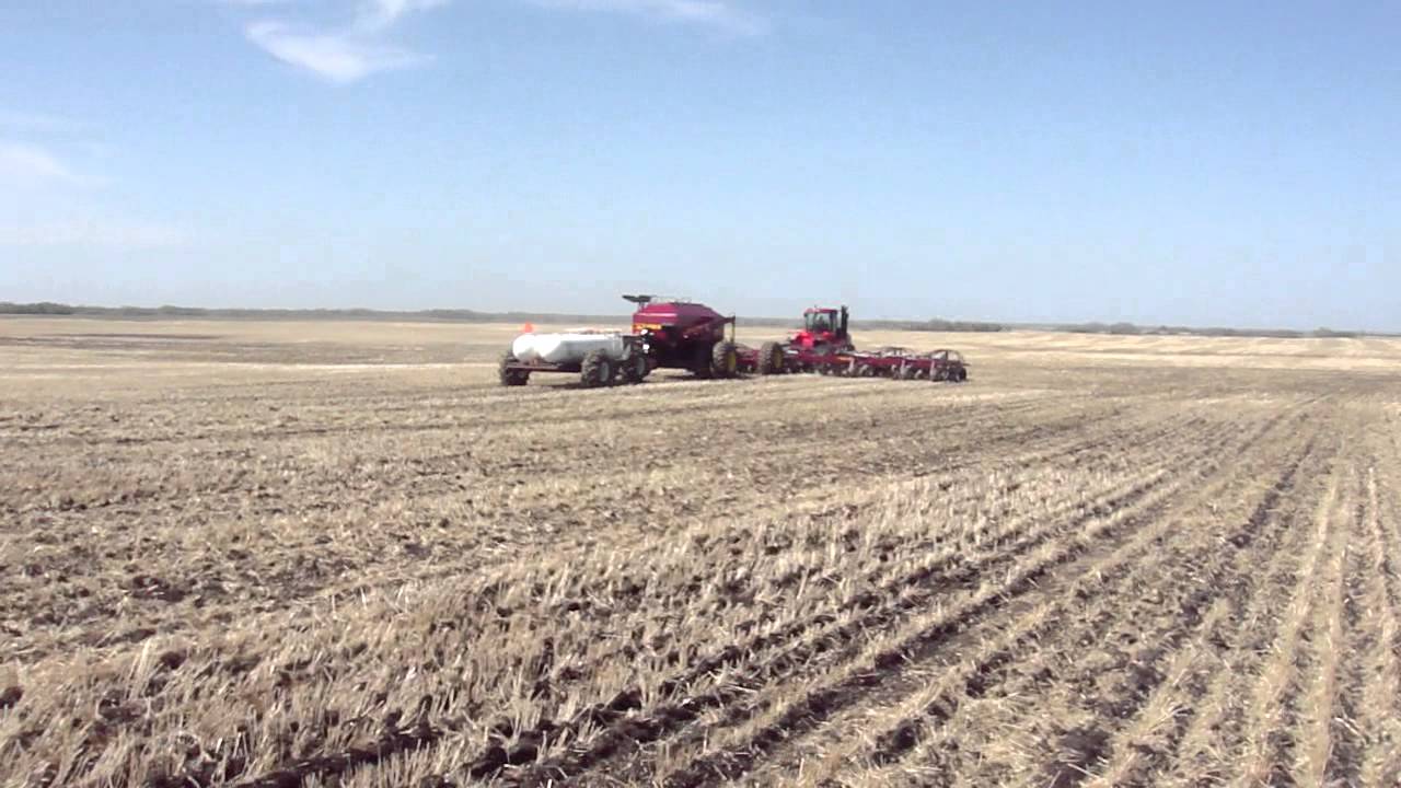 Seeding with 535 quadtrac and seed hawk - YouTube