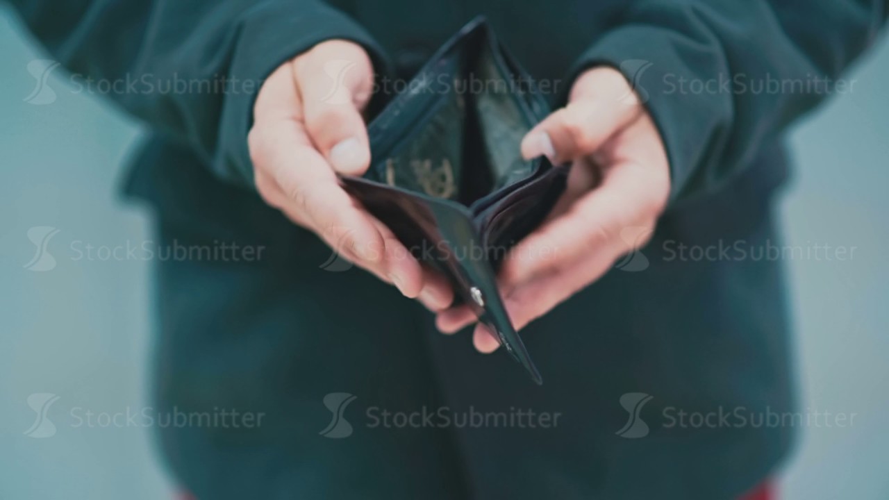 Man turns an empty wallet in his hand - YouTube