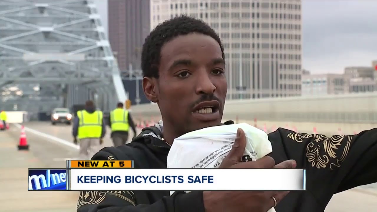 Bike path on Cleveland bridge gets makeover with unique substance - YouTube