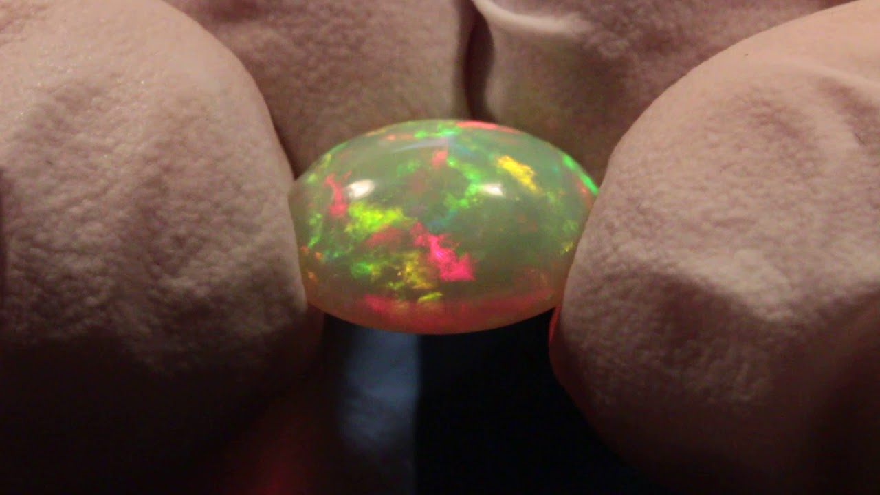 2,5ct Floral pattern Ethiopian Delanta Welo opal oval cabochon - YouTube