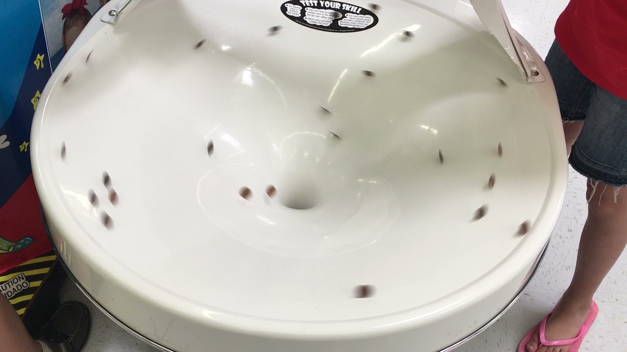 Putting A Lot Of Coins Down A Spiral Wishing Well - YouTube