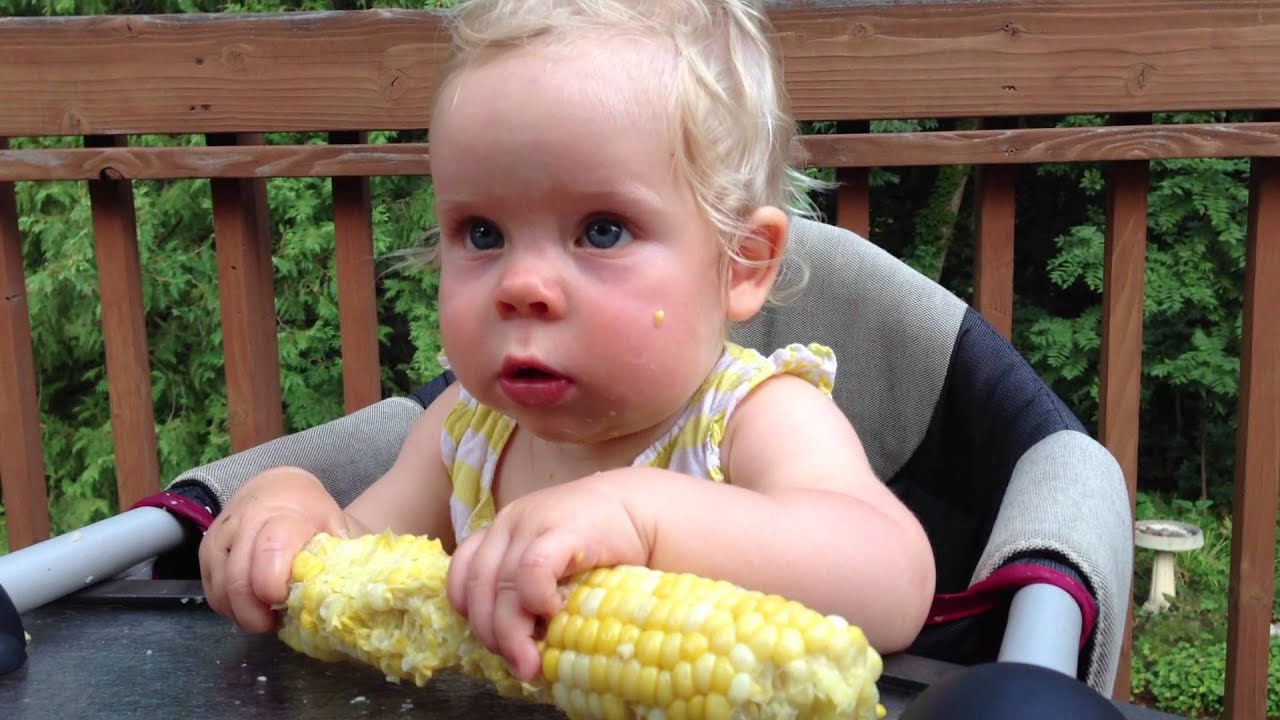 Baby loves her Iowa sweet corn - YouTube