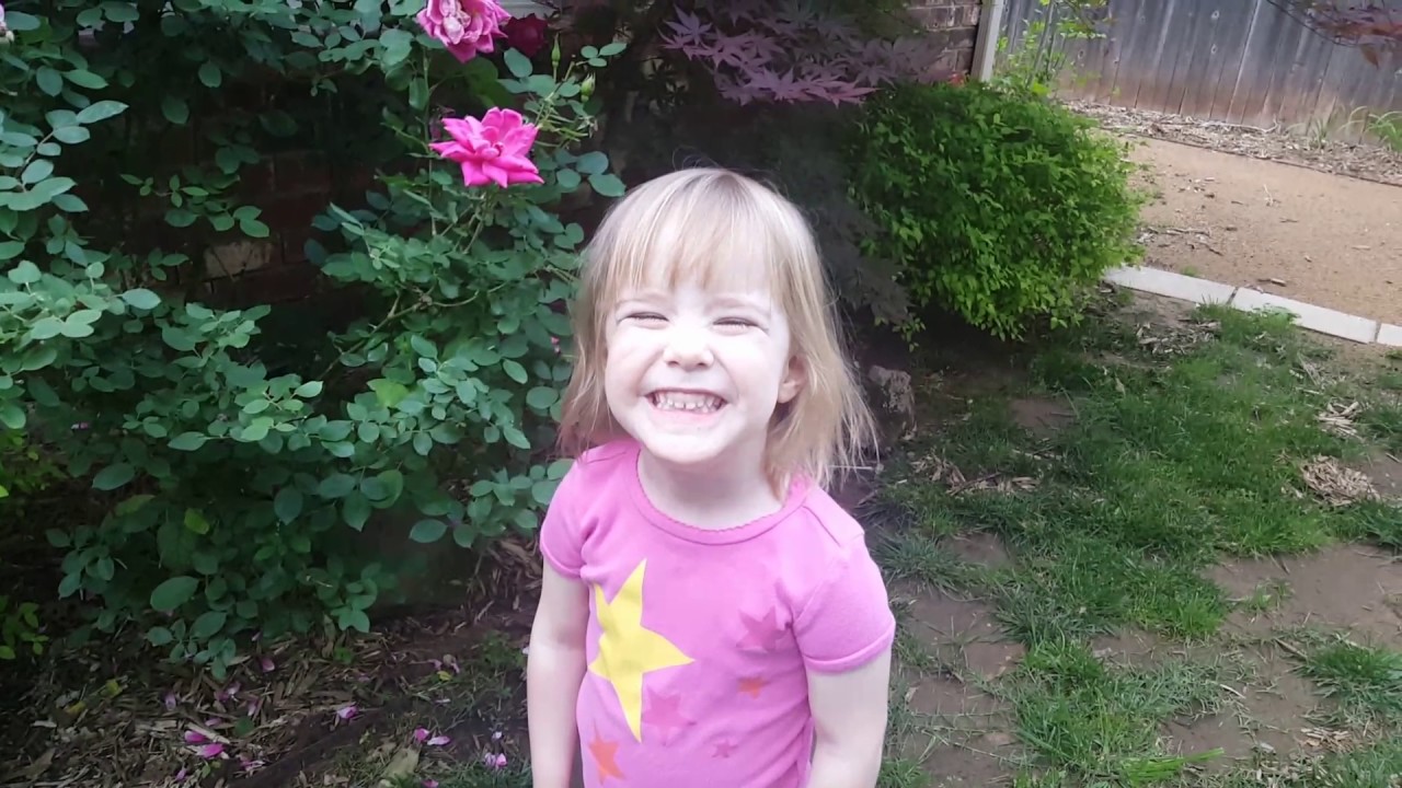 Addie smelling flowers - YouTube