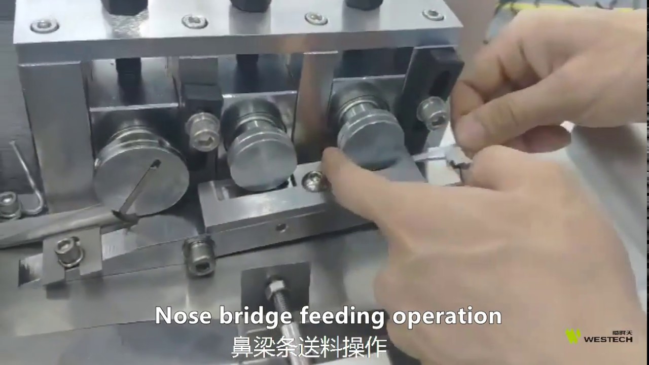 Face mask Nose Bridge Bar feeding operation - YouTube