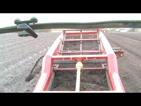 Planting Potatoes destoning 6,4,09 - YouTube