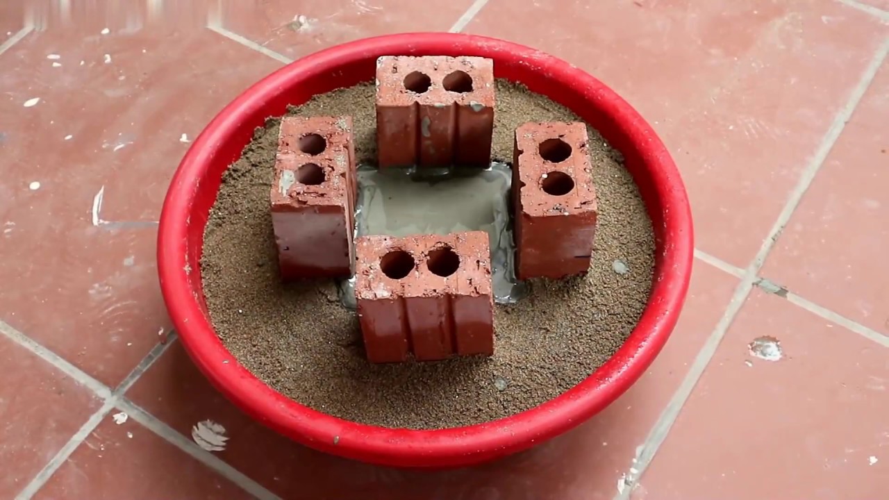 Make a simple and beautiful fish tank with cement and stone - YouTube