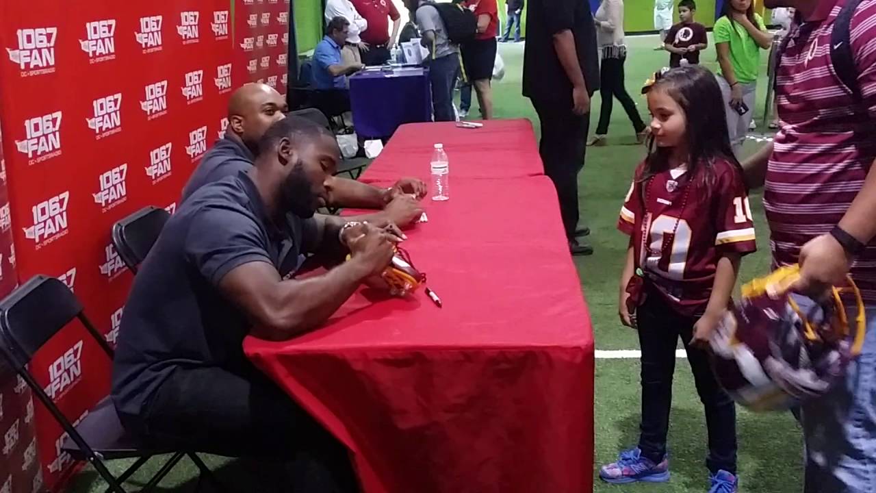 Pierre Garcon ip signing autographs for us at fanfest Chantilly VA ...