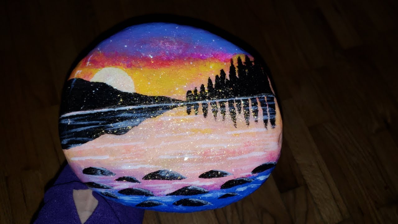 acrylic landscape painting on river rock with a resin top coat / resin ...