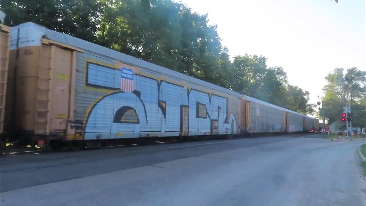 A Very Long CSX M511 With a Rebuild Leader, YN3C Dash 8, Mid-Train DPU, and a friendly crew ...