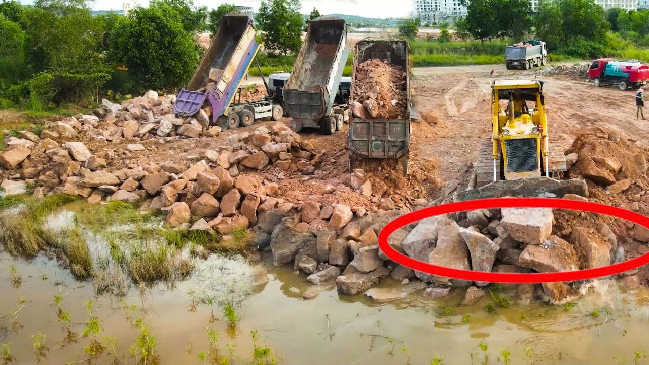 Mostly Powerful Big Bulldozer Pushing Huge Stone & Many Dumper Truck ...