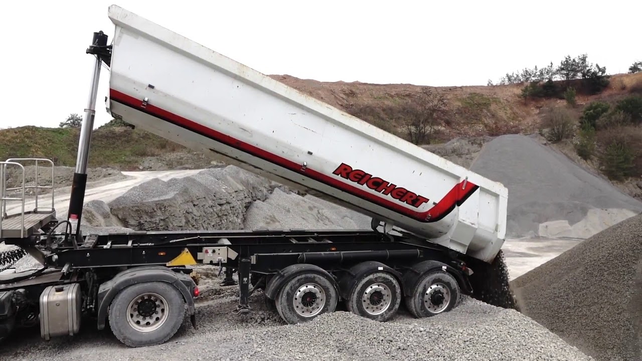 Dennison sliding bogie tipper trailer has got traction - YouTube