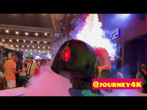 Girl in Beautiful Red Dress Riding on a Bull in Benidorm   Bull Riding 4K