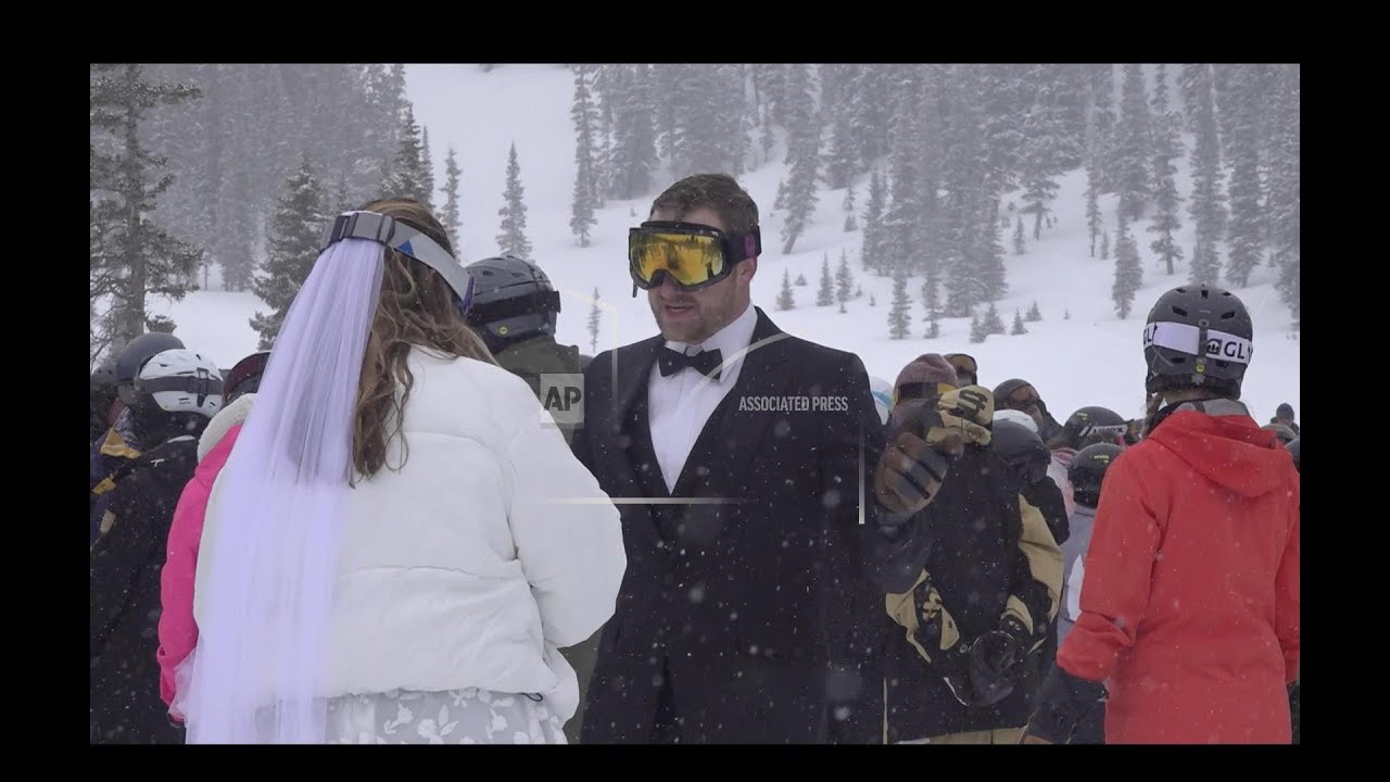 Dozens of couples get hitched at snowy Colorado ski resort on Valentine ...