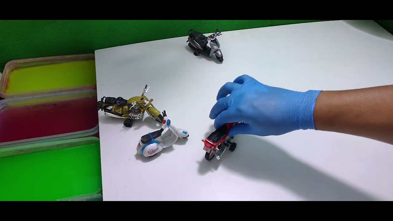 check two wheeler working before dipping in colorful water - YouTube