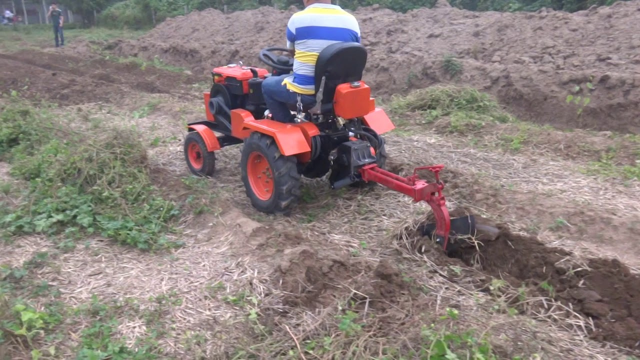 Mini tractor with single row plough - YouTube