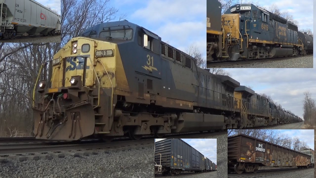 CSX Freight Q561 - (Penn Central Gondola) - YN2 AC4400CW #31, ES40DC #5463 & GP40-2 #6415 ...