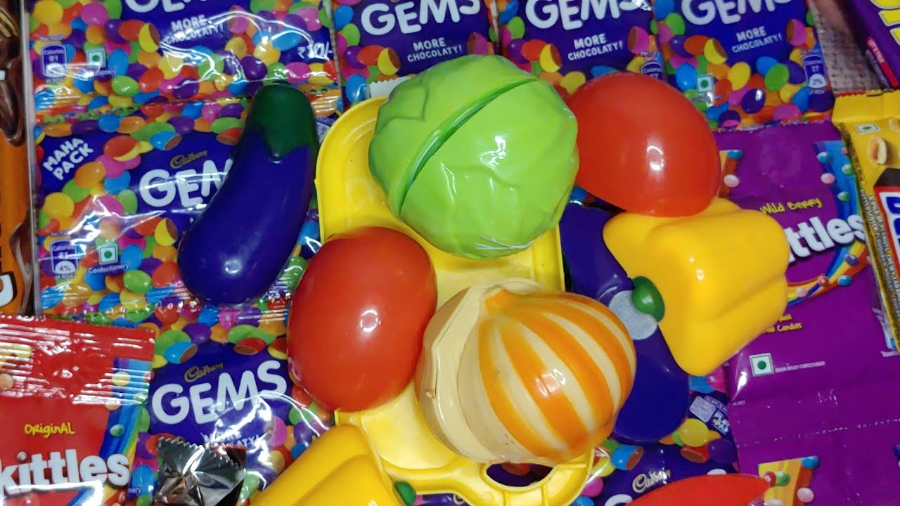 Colourful cutting vegetables set and lot's of Cadbury gems - YouTube