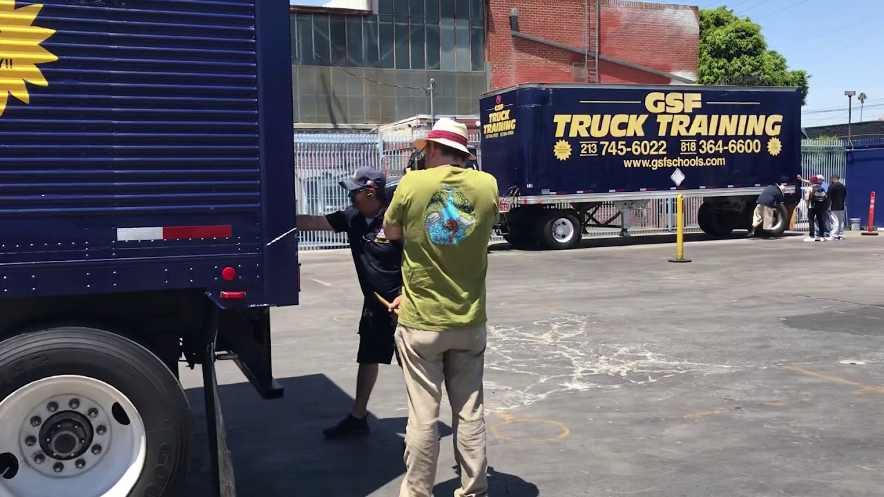 Channel 34 Univision Oswaldo Borraez and cameraman at GSF Truck & Bus ...
