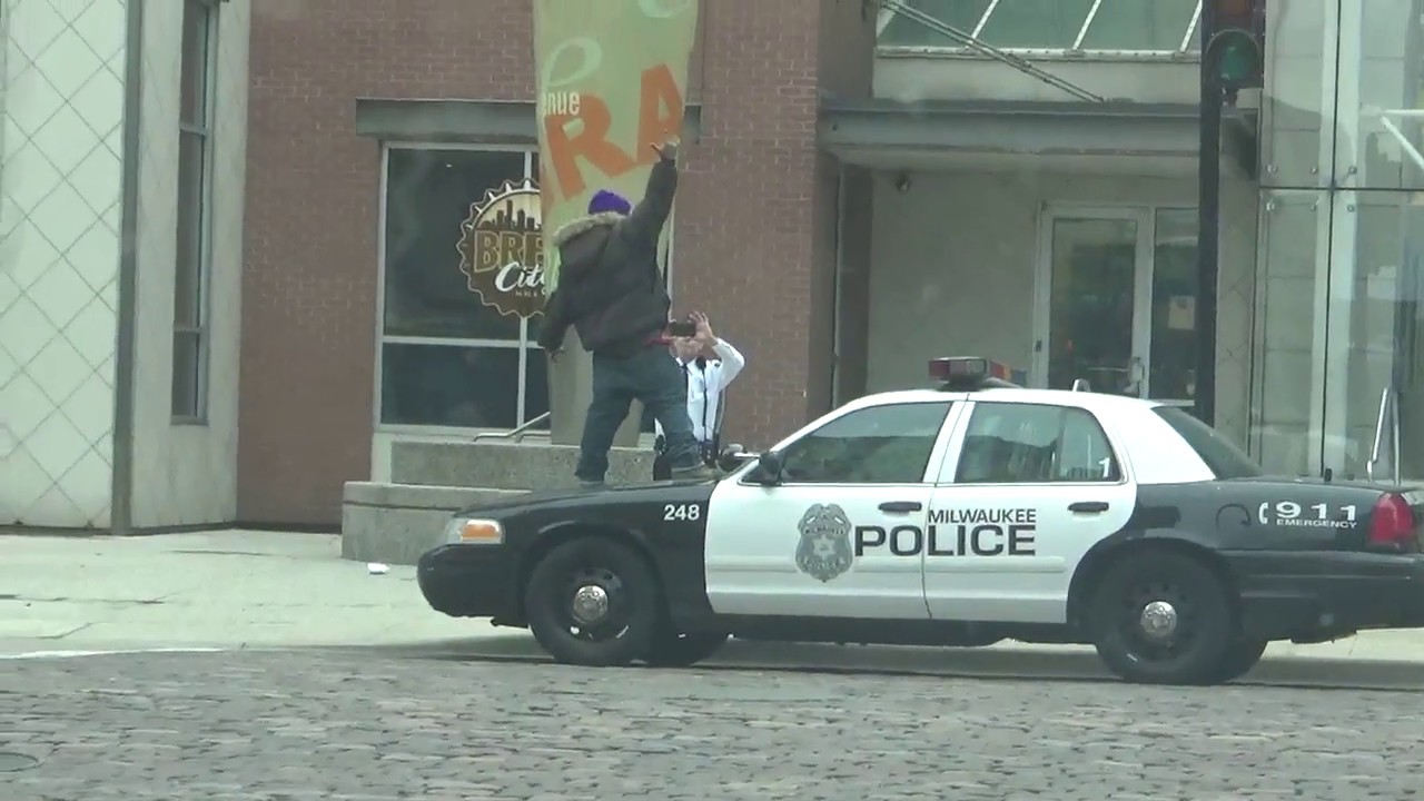 Man Dances On Top Of Police Car!!! - YouTube