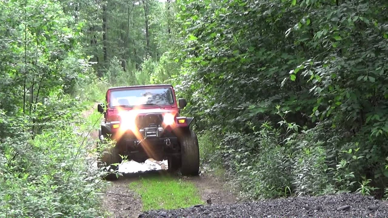Jeep Wrangler TJ on 37s parking lot Crawling - YouTube