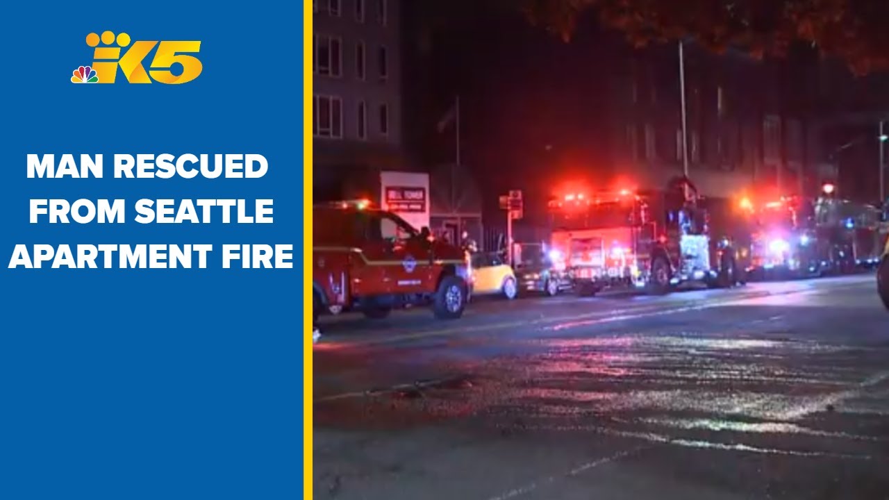 Man rescued from apartment building fire in Seattle - YouTube