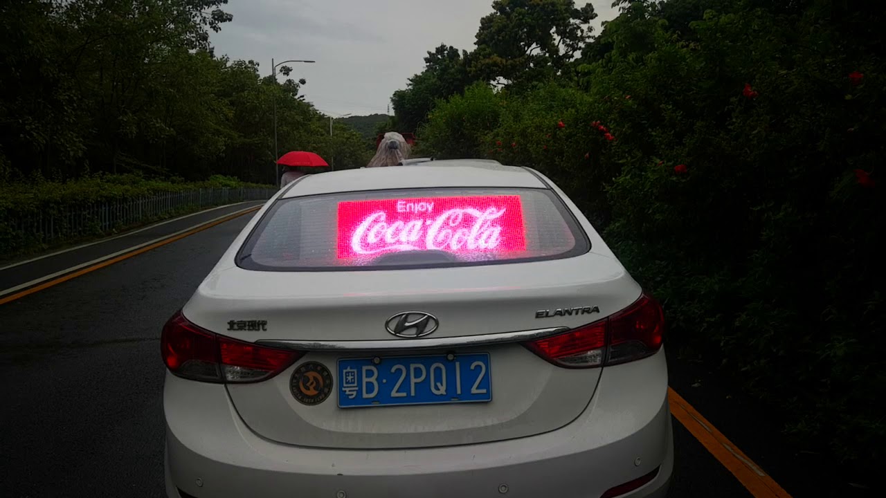 Taxi rear window transparent led display - YouTube