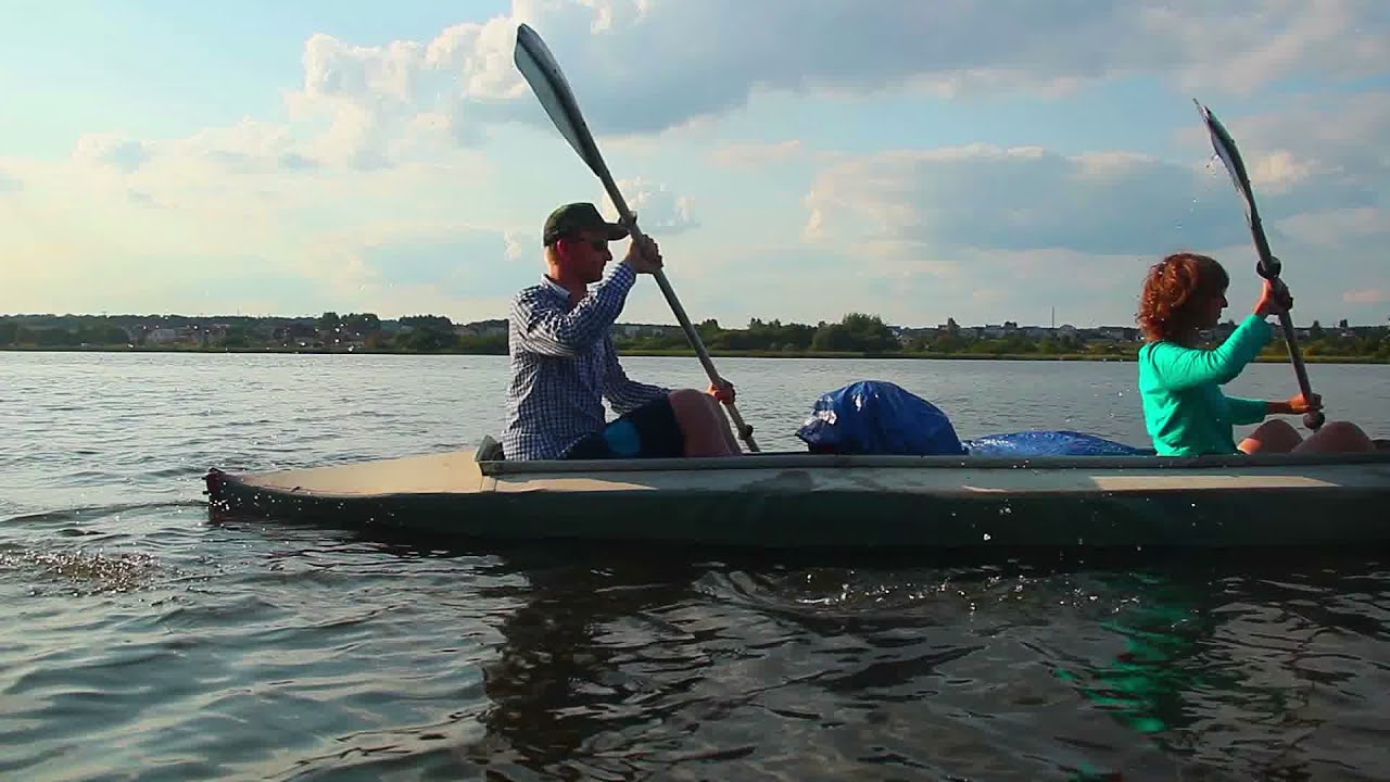 Man and woman paddle boat synchronously, teamwork, togetherness. Stock ...