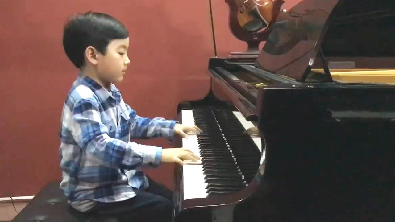 Seven-Year-Old Piano Virtuose Evan Le - YouTube