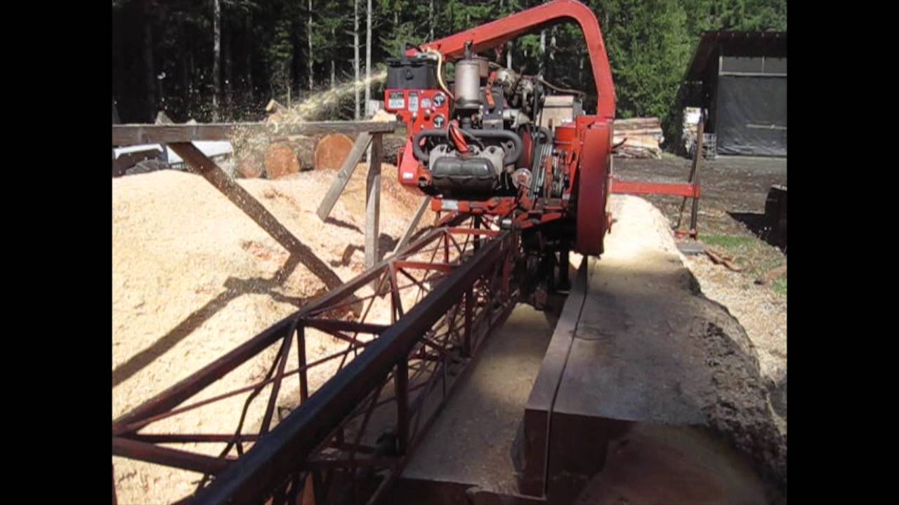 Cutting a huge log - YouTube