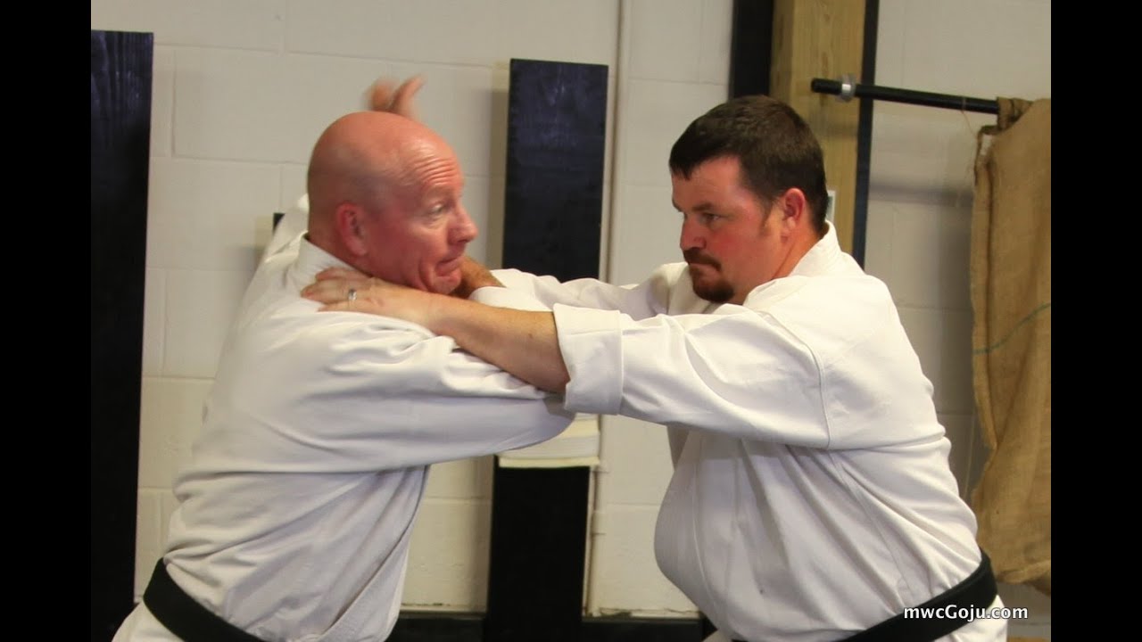 AEA Self-defense Technique 8 - Defense Against an Aggressive Two-Handed ...