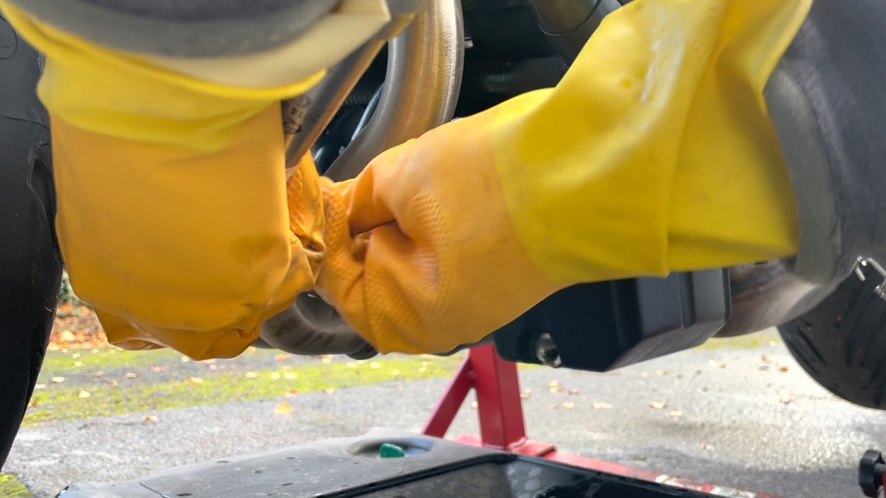 Triumph Trident 660 how to change the oil and filter - YouTube