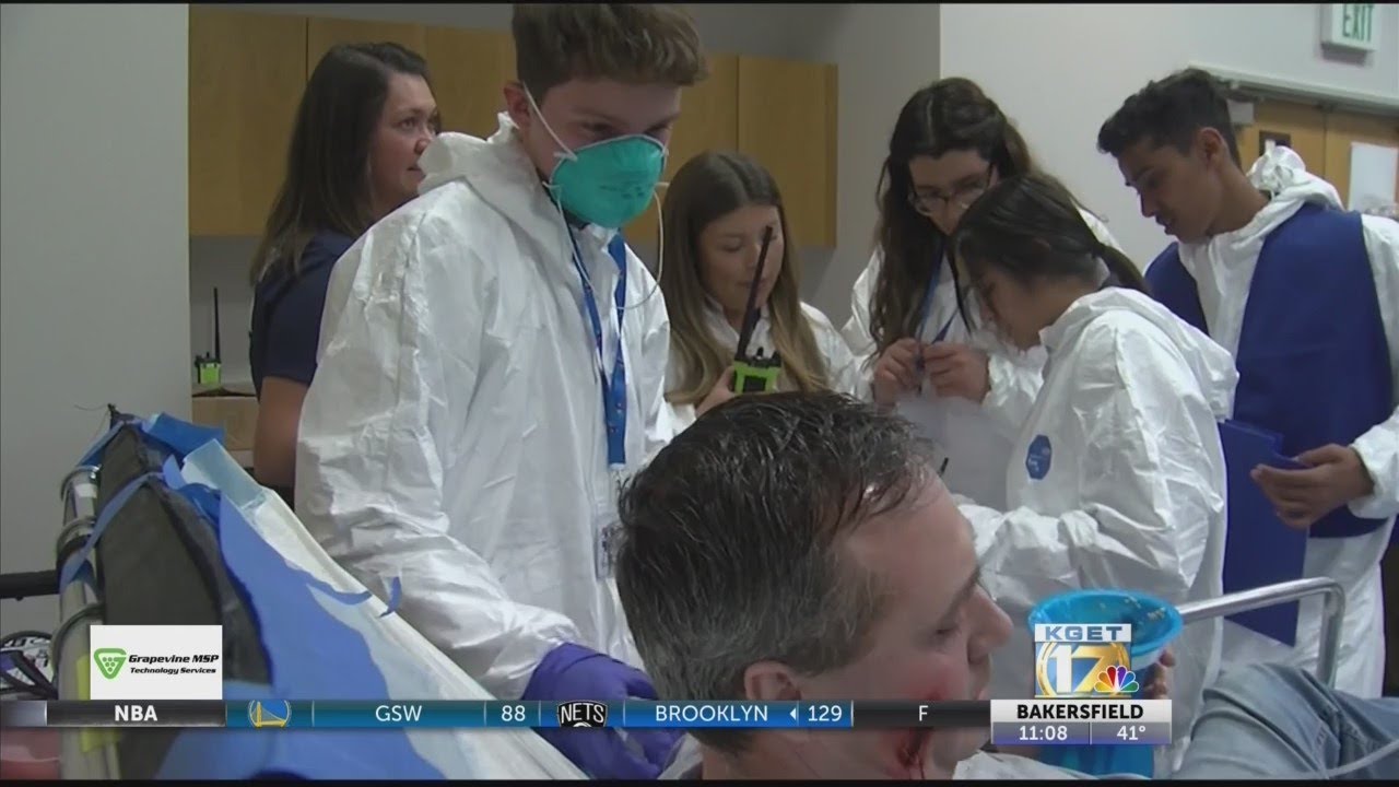 High school students learn about public health through disease outbreak simulation - YouTube