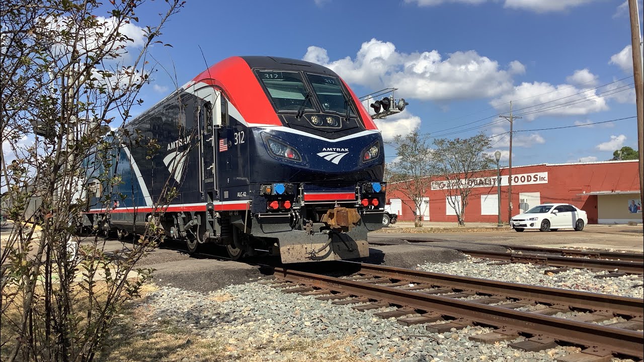 Catching AMTK 312 leading the southbound in her new scheme! - YouTube