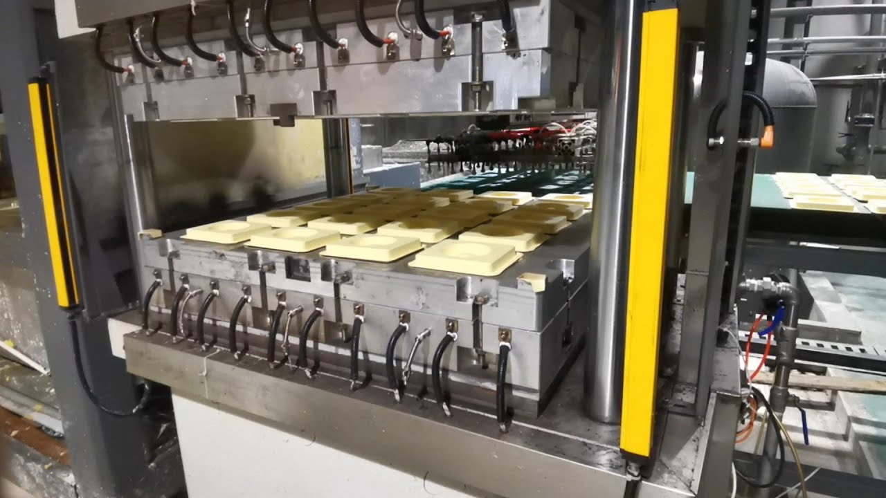 Mold forming of the pulp package. - YouTube