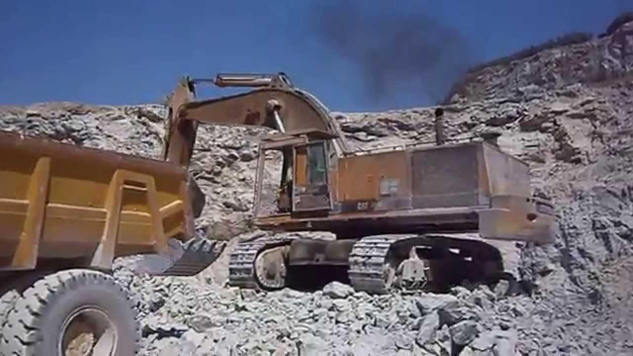 cat 245 loading - YouTube