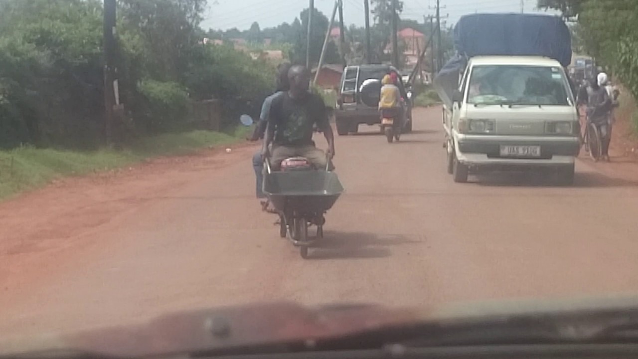 Ugandan Wheelbarrow style - YouTube