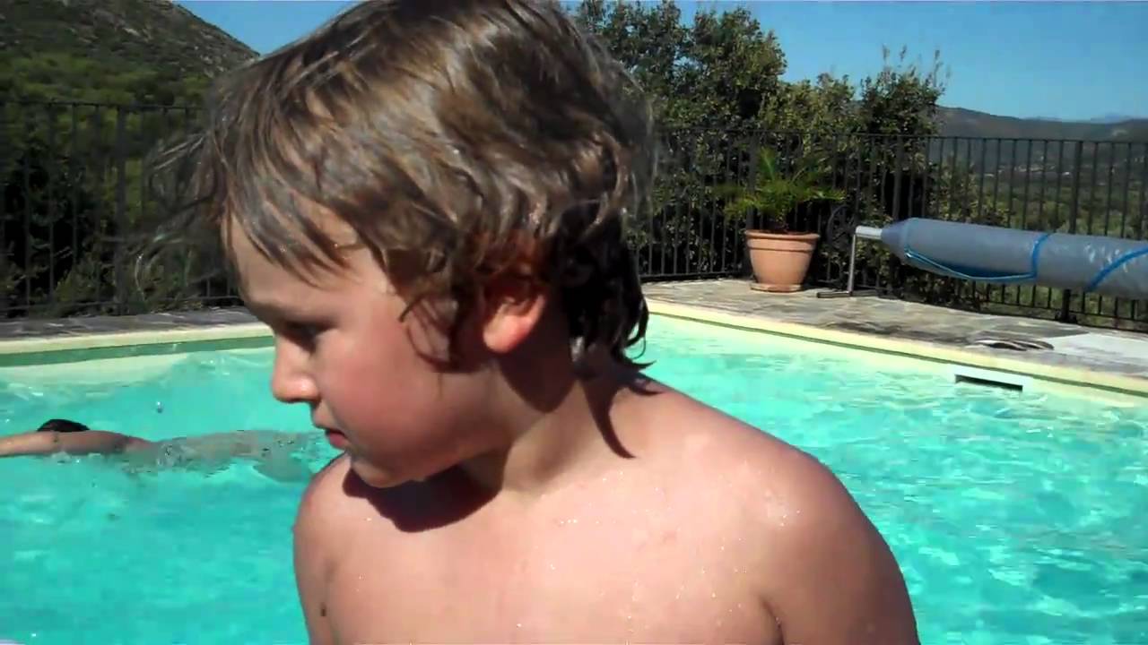 Learning to swim on holiday - YouTube